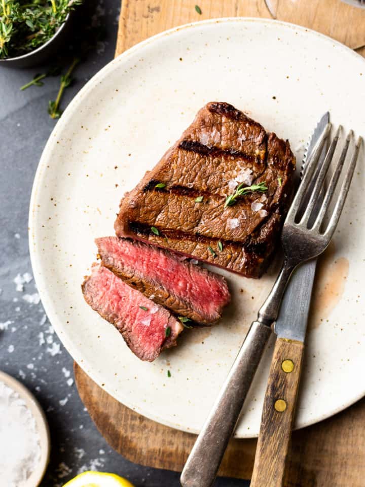 Grilled Bison Tomahawk Steak with Chimichurri Butter - Modern Farmhouse ...