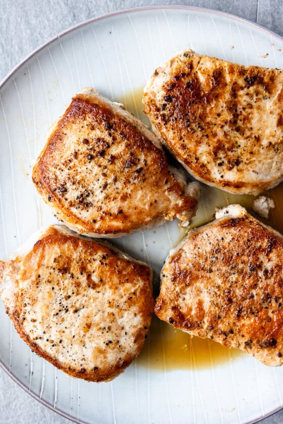 Dutch Oven Pork Chops with Dijon Cream Sauce - Modern Farmhouse Eats